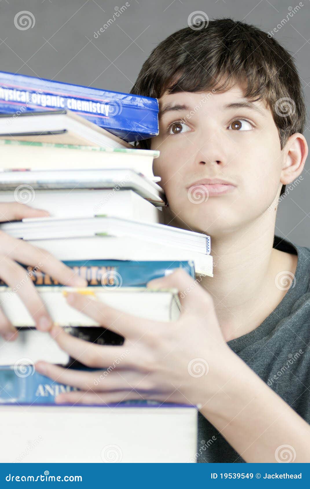 Overwhelmed Teen Holds Stack of Textbooks Stock Image - Image of back ...