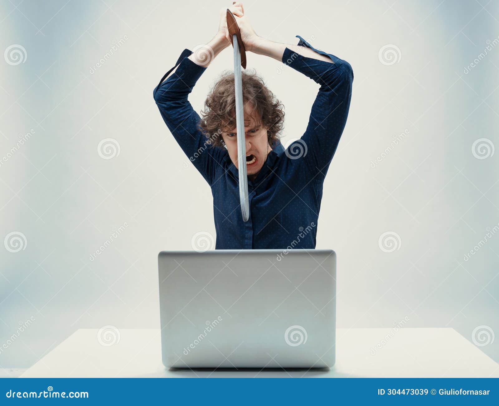 Overwhelmed User Threatens Computer with Sharp Sword Stock Image ...