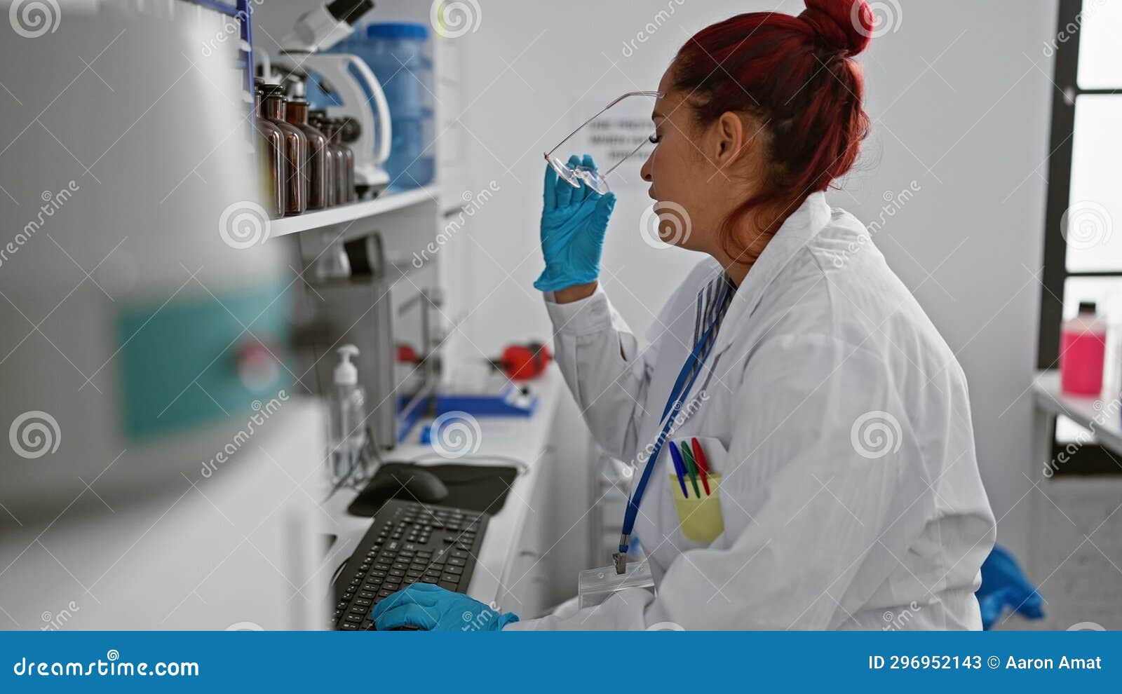 Overwhelmed Young Redhead Woman Scientist Stressed Out Taking Off Glasses Amidst High Stakes