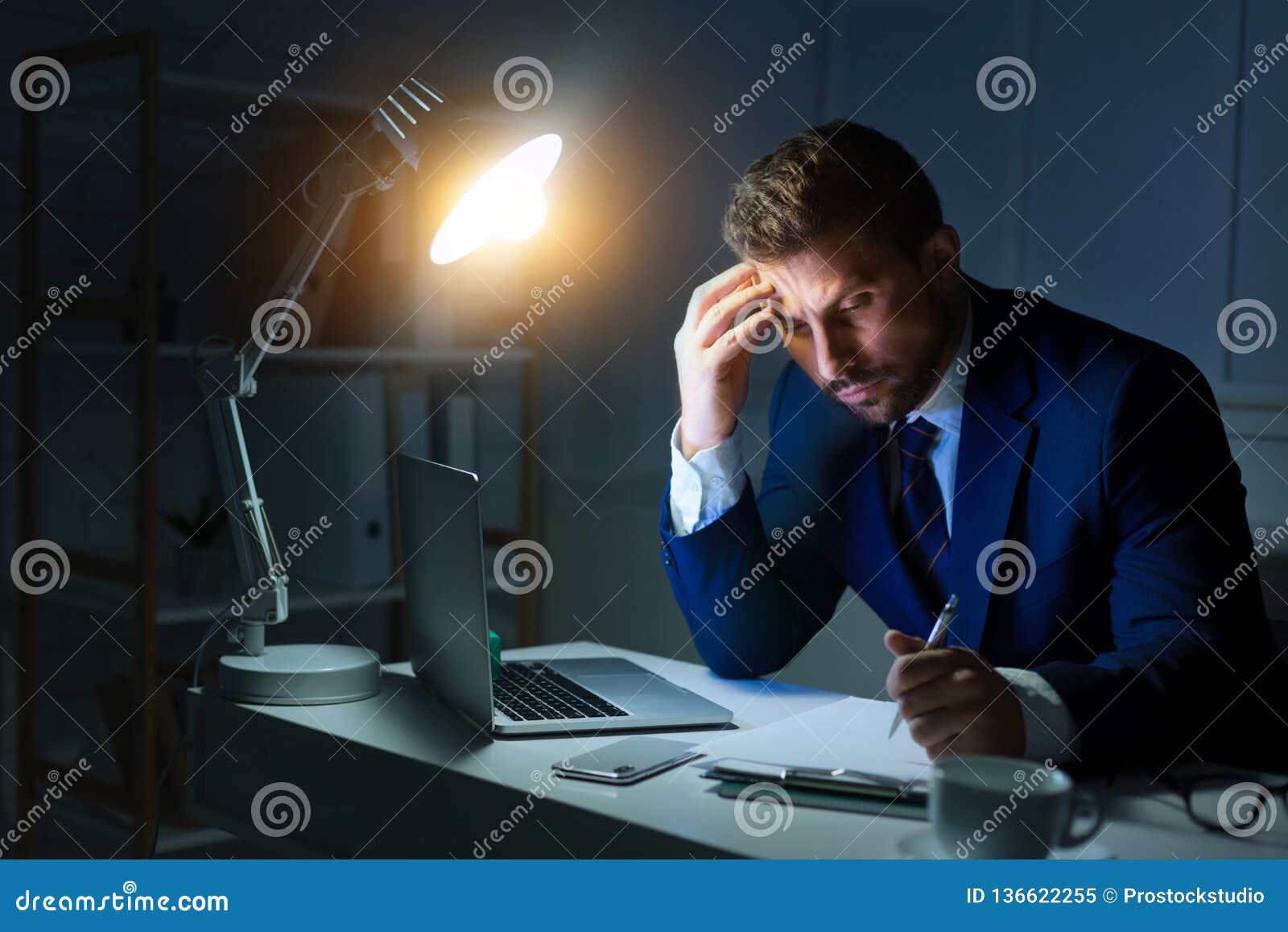 Overwork. Businessman Working with Laptop and Writing Report Stock ...