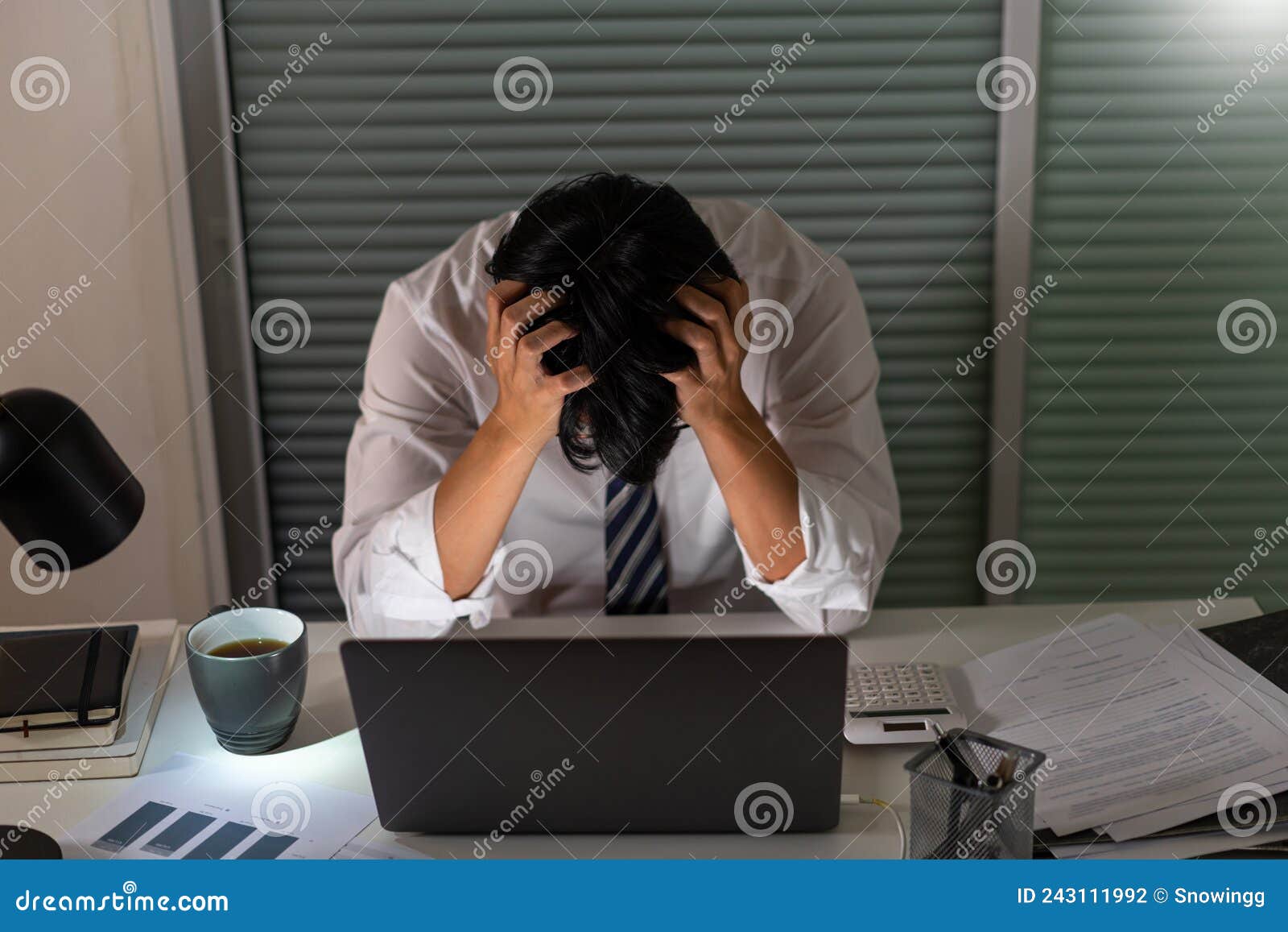 Overwork Concept the Male Who Works at the Office Tonight Holding His ...