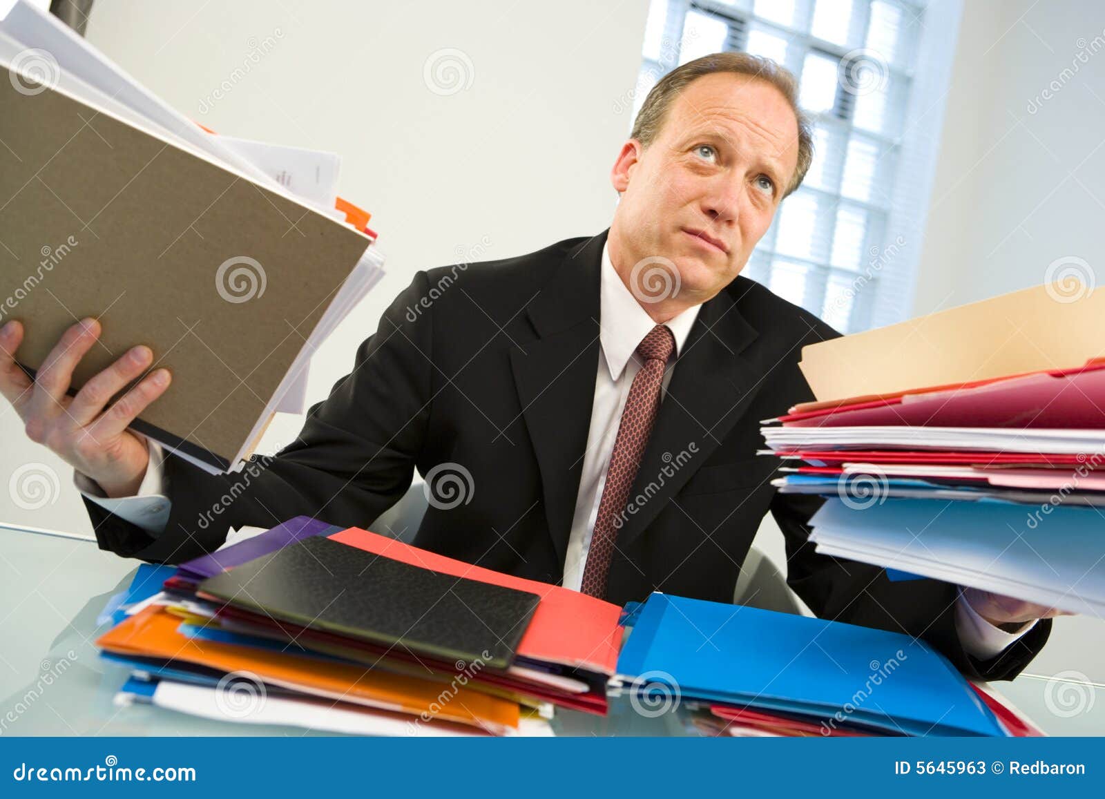 Overworked businessman stock image. Image of caucasian - 5645963
