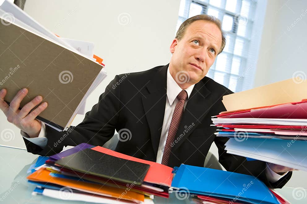 Overworked businessman stock image. Image of caucasian - 5645963