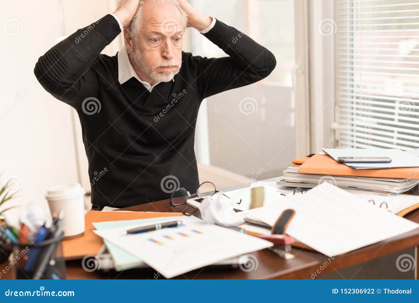 Overworked Businessman Sitting at a Messy Desk Stock Photo - Image of ...