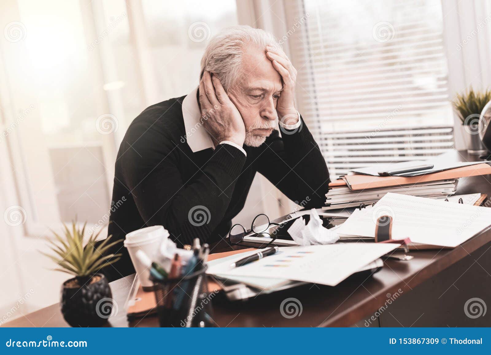 Overworked Businessman Sitting at a Messy Desk Stock Image - Image of ...