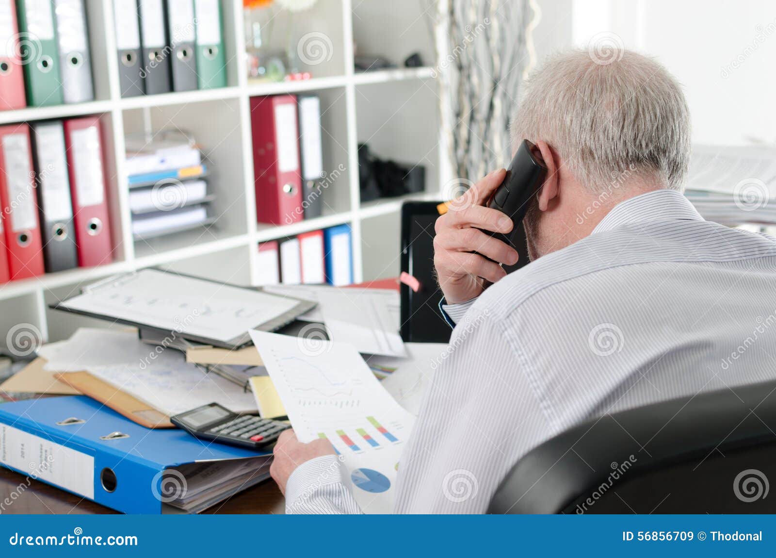 Overworked businessman stock image. Image of documents - 56856709