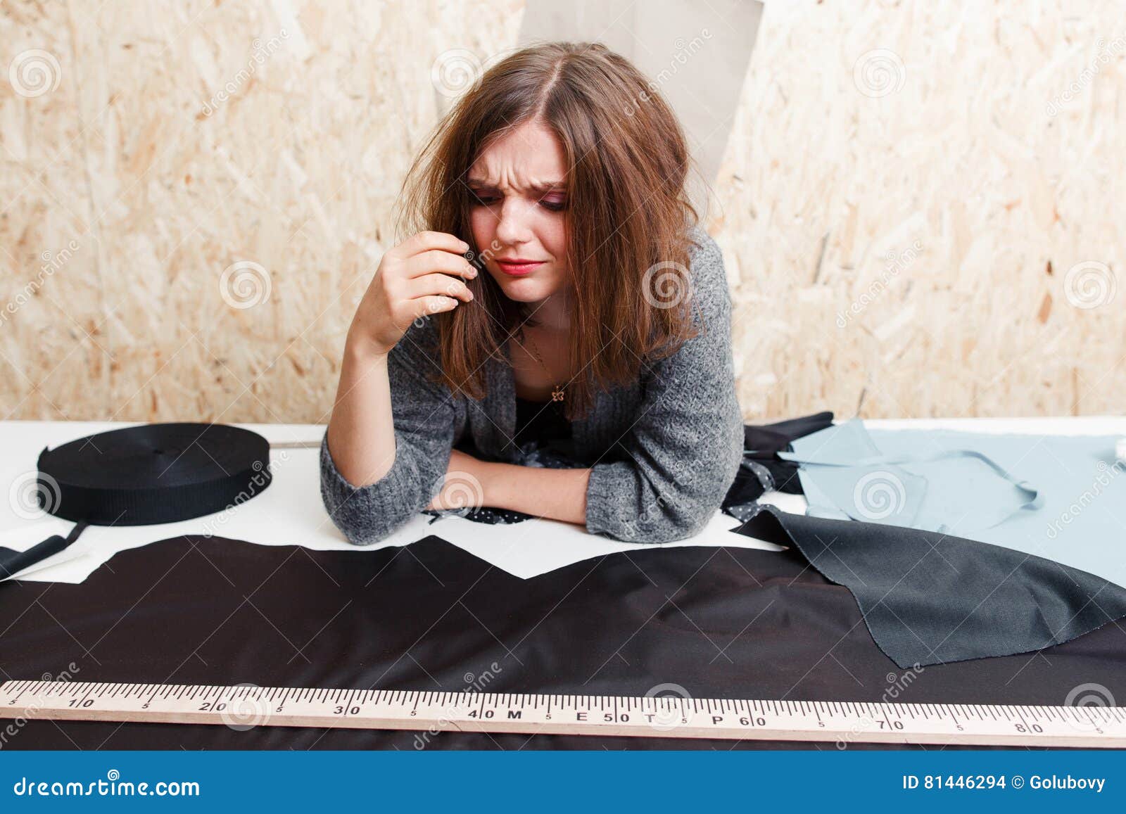 Overworked Designer Crying Above Fabric Stock Photo - Image of negative ...