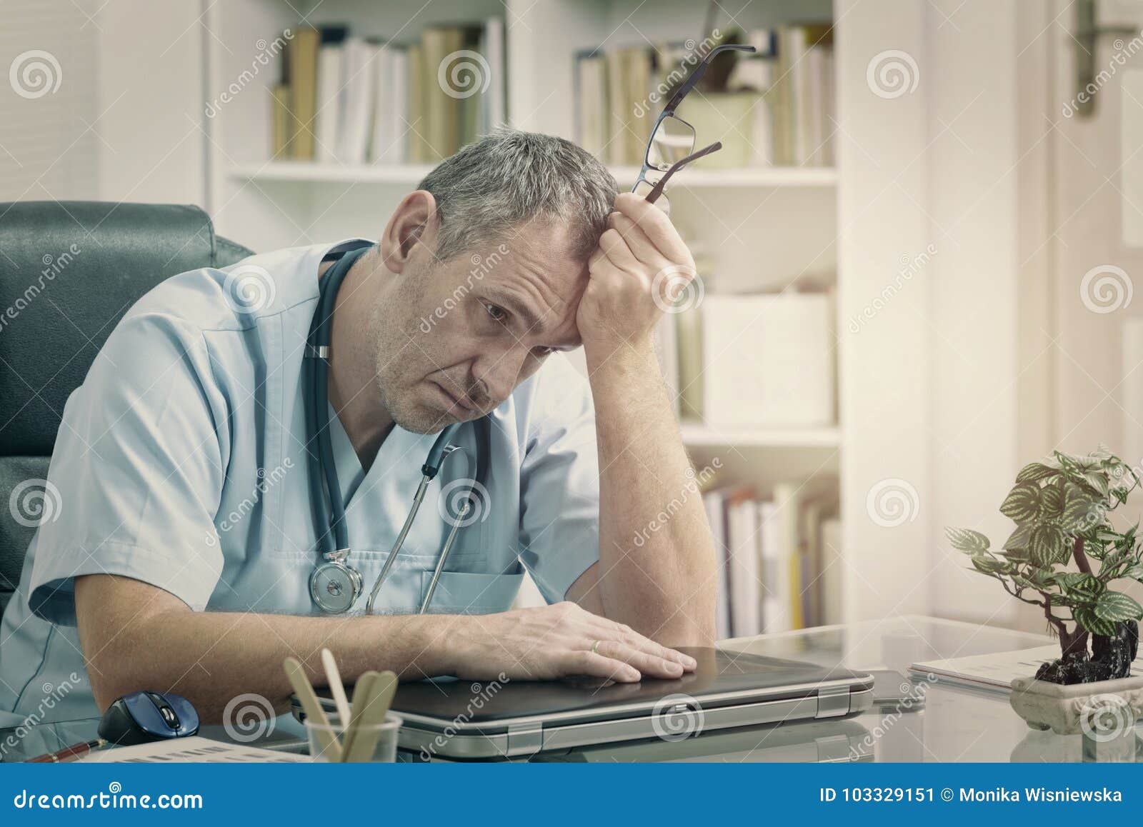 Overworked Doctor in His Office Stock Image - Image of laptop ...
