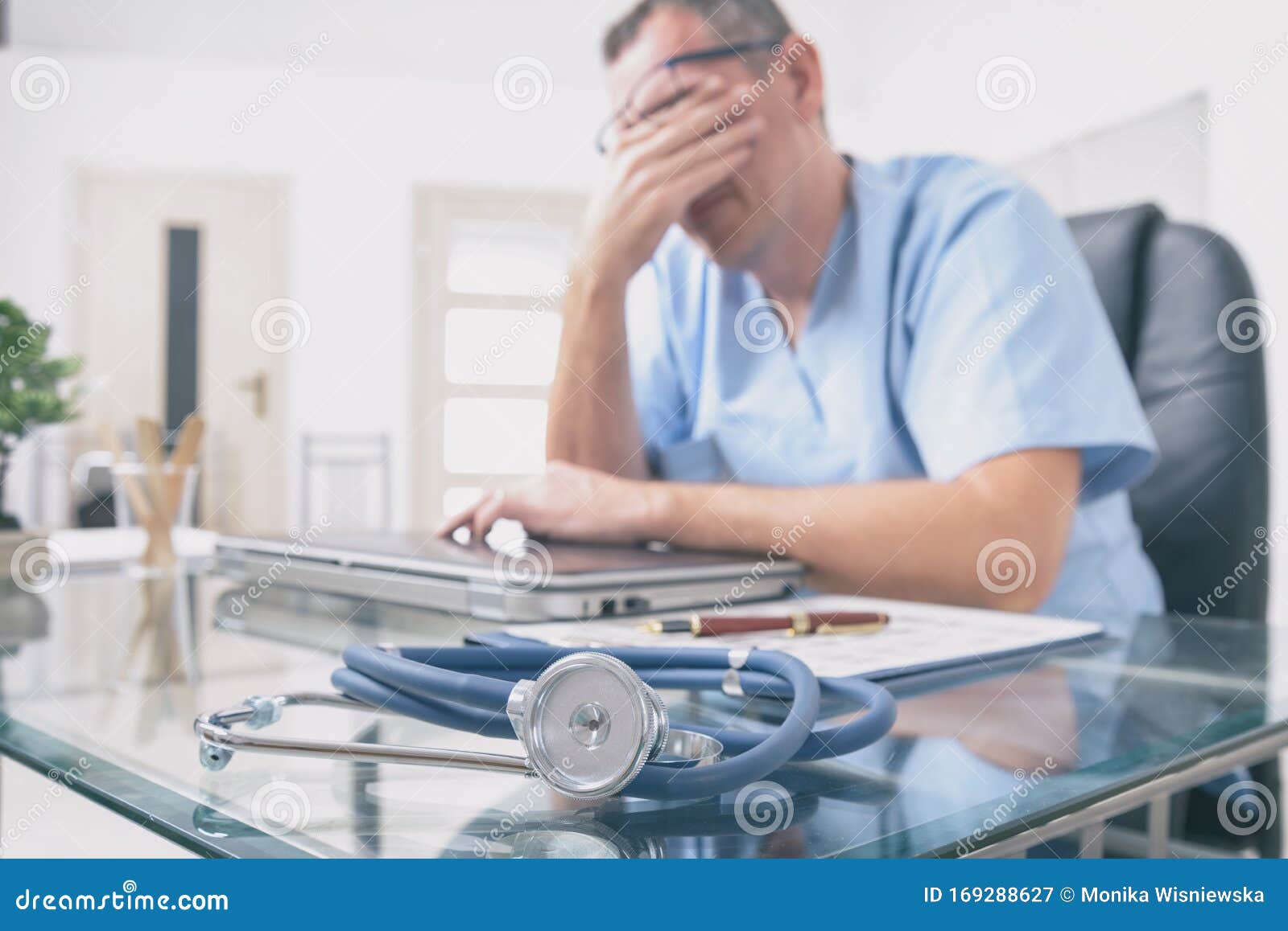 Overworked Doctor in His Office Stock Image - Image of emotional ...