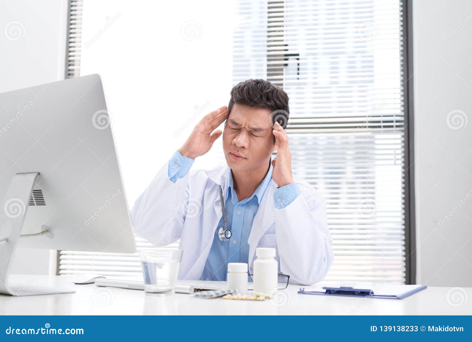 Overworked Doctor Sitting in His Office Stock Image - Image of thinking ...