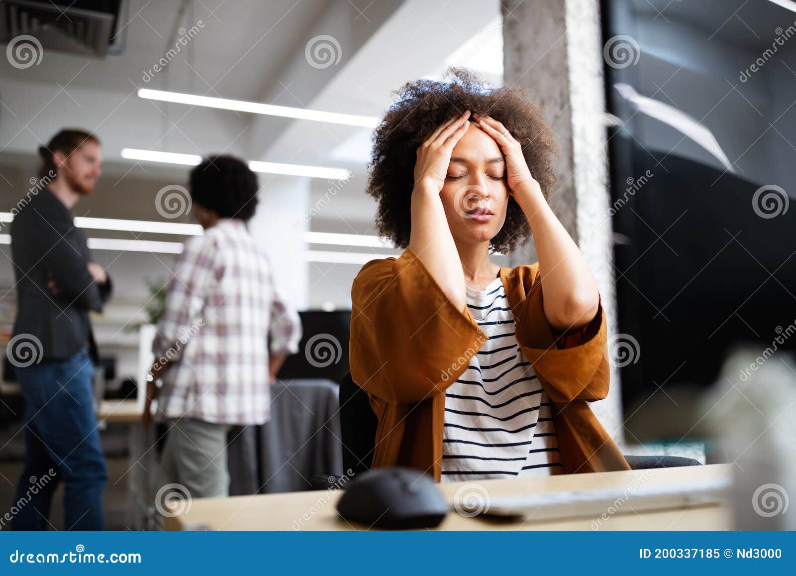 Overworked and Frustrated Young Woman in Front of Computer in Office ...