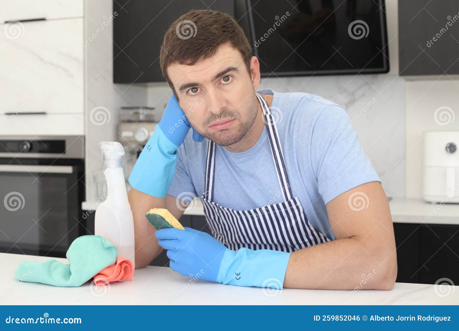 Overworked Looking Man Cleaning the Kitchen Stock Photo - Image of ...