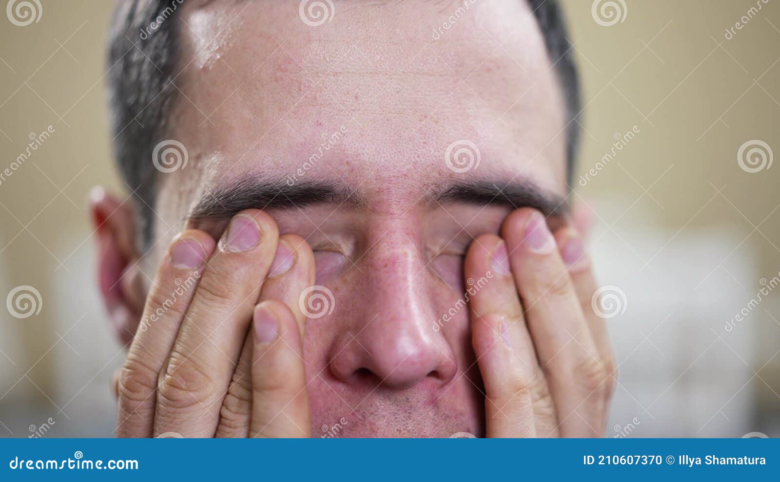 Tired man rubs his eyes stock footage. Video of massaging - 210607370