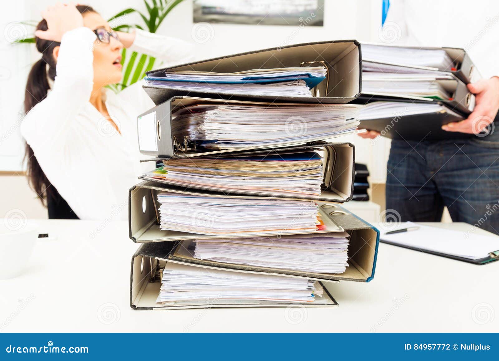 Overworked Secretary with Folders Stock Photo - Image of businessman ...