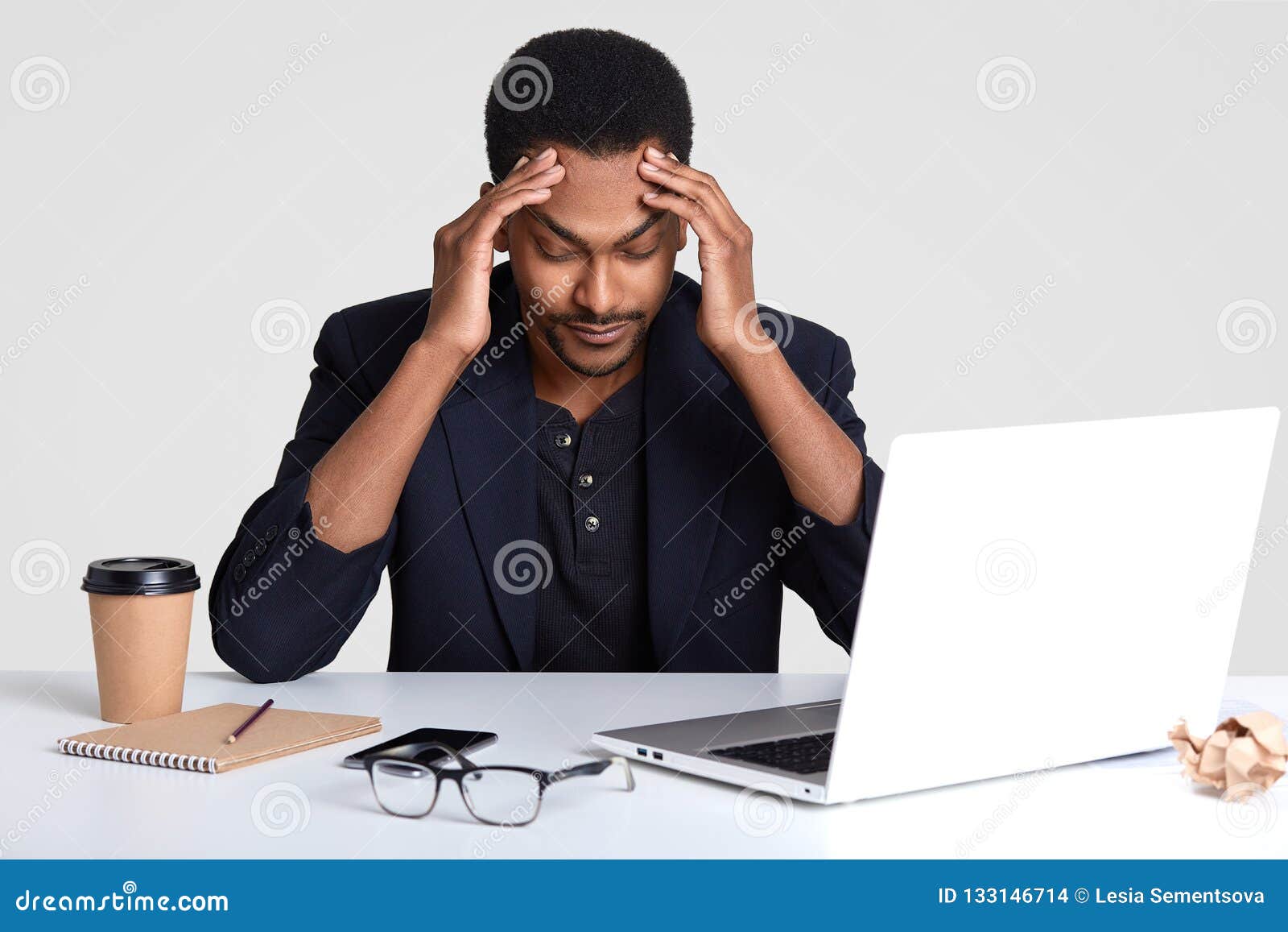 Overworked Stressful Man Keeps Hands on Head, Keeps Gaze Down, Being ...