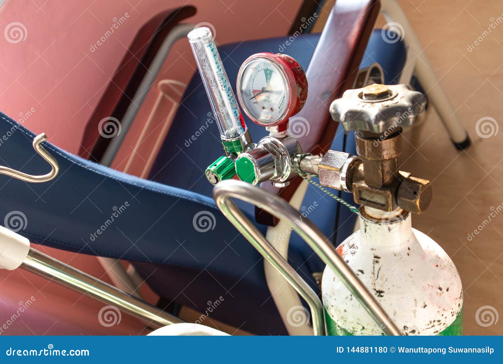 Oxygen Cylinder with a Chair Behind Stock Photo - Image of oxygen ...