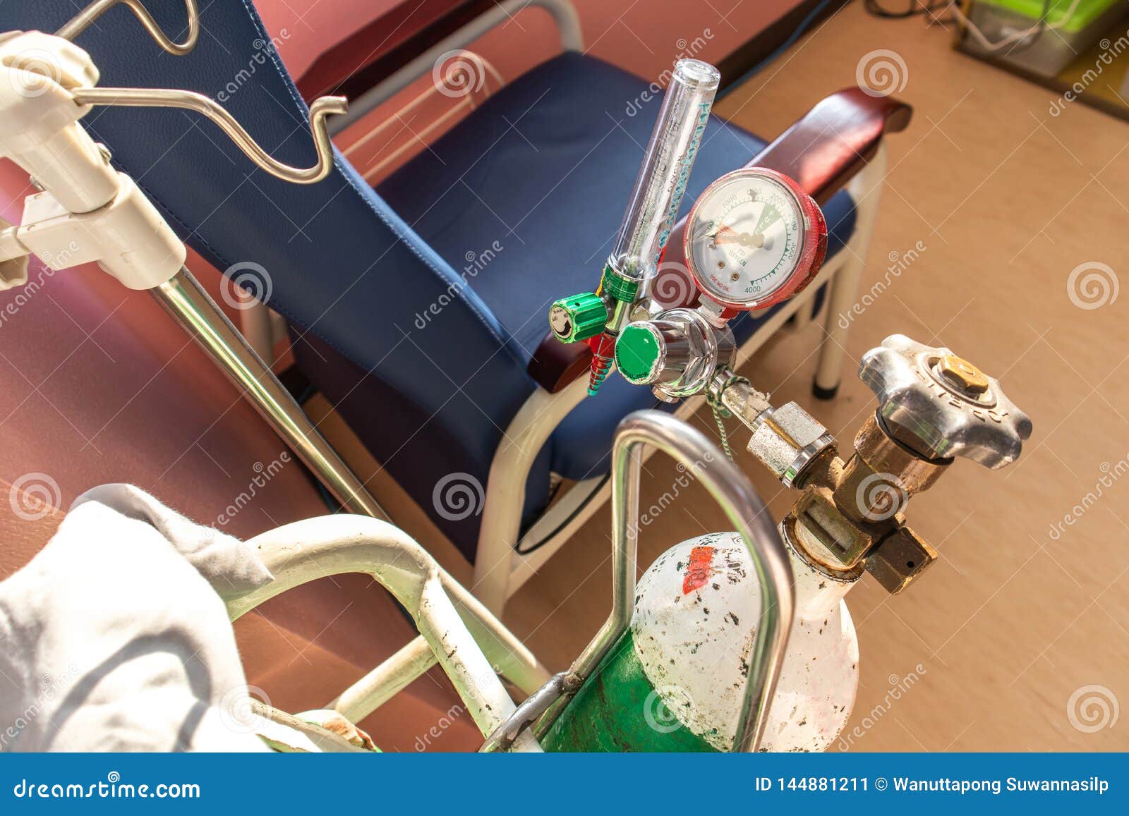 Oxygen Cylinder with a Chair Behind Stock Image - Image of clinic ...