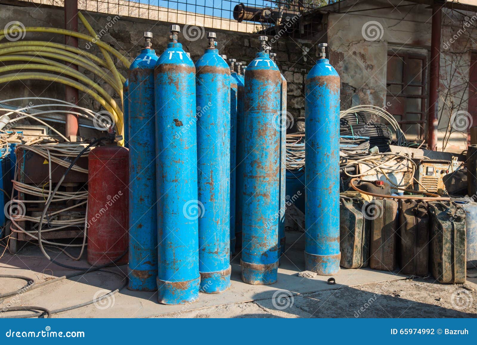 Oxygen and Gas Cylinders stock photo. Image of cylinders - 65974992
