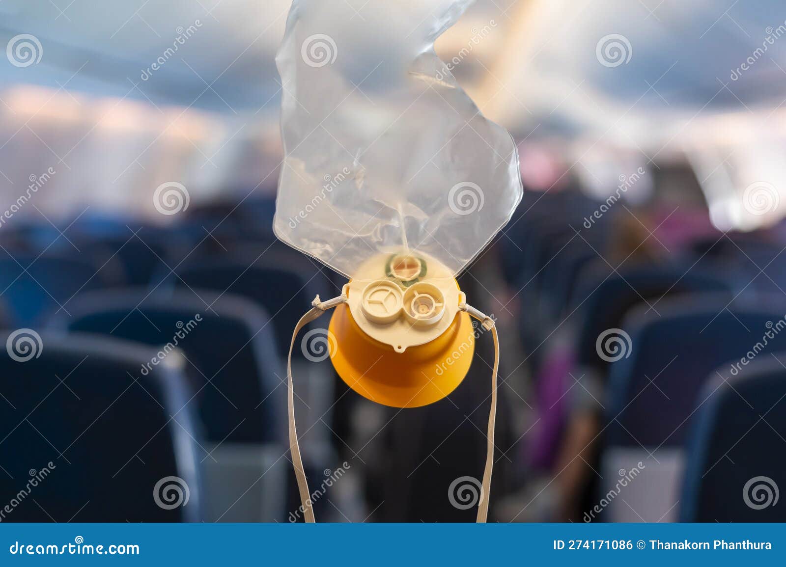 Oxygen Mask Drop from the Ceiling Compartment on Airplane Stock Photo ...