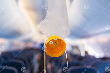Oxygen Mask Drop from the Ceiling Compartment on Airplane Stock Image ...