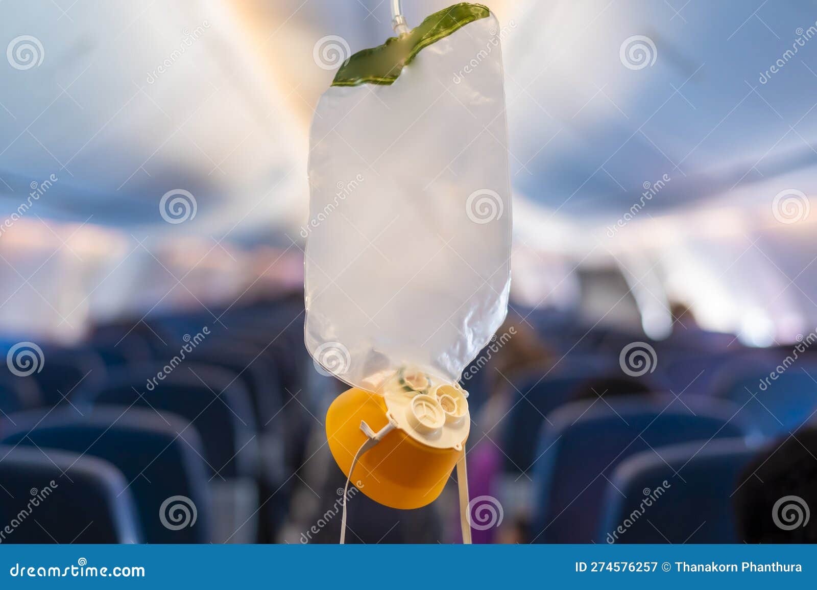 Oxygen Mask Drop from the Ceiling Compartment on Airplane Stock Image ...