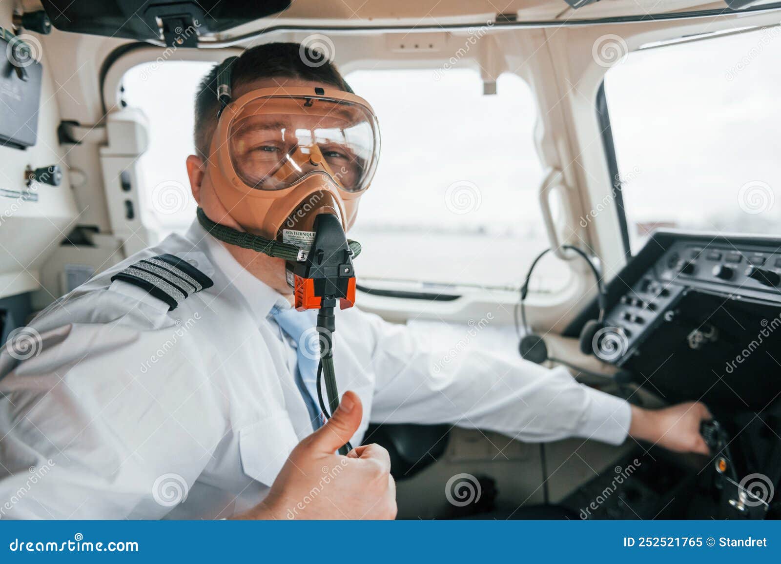 In Oxygen Mask. Pilot on the Work in the Passenger Airplane Stock Image ...