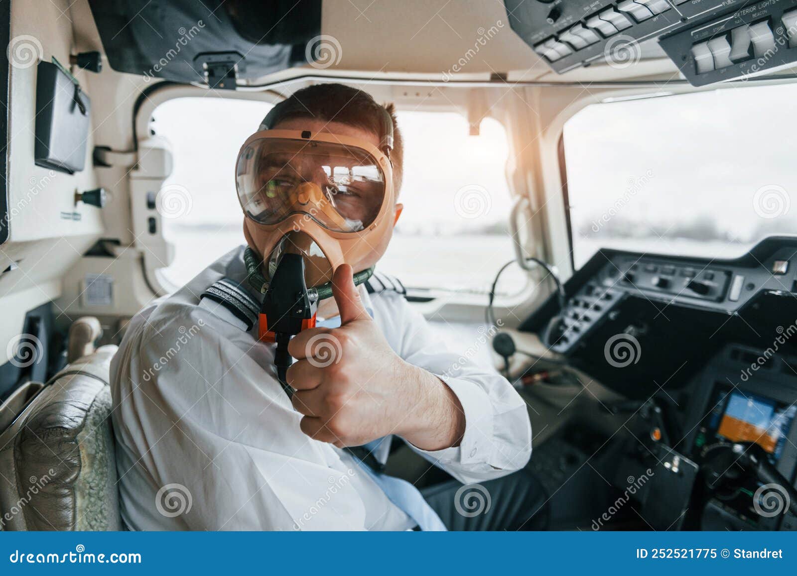 In Oxygen Mask. Pilot on the Work in the Passenger Airplane Stock Image ...