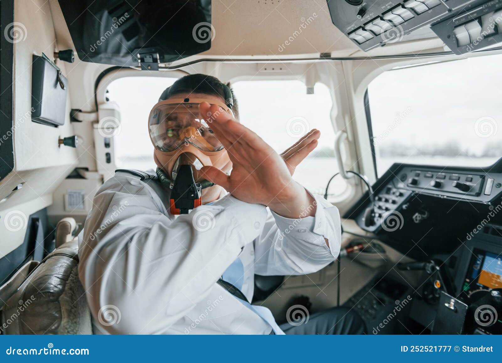 In Oxygen Mask. Pilot on the Work in the Passenger Airplane Stock Image ...