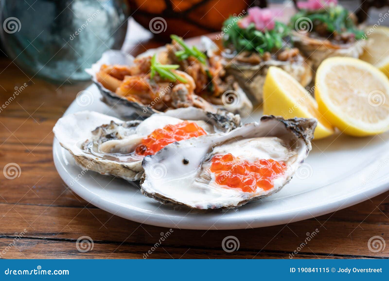 Oysters on a Half Shell stock image. Image of creme - 190841115
