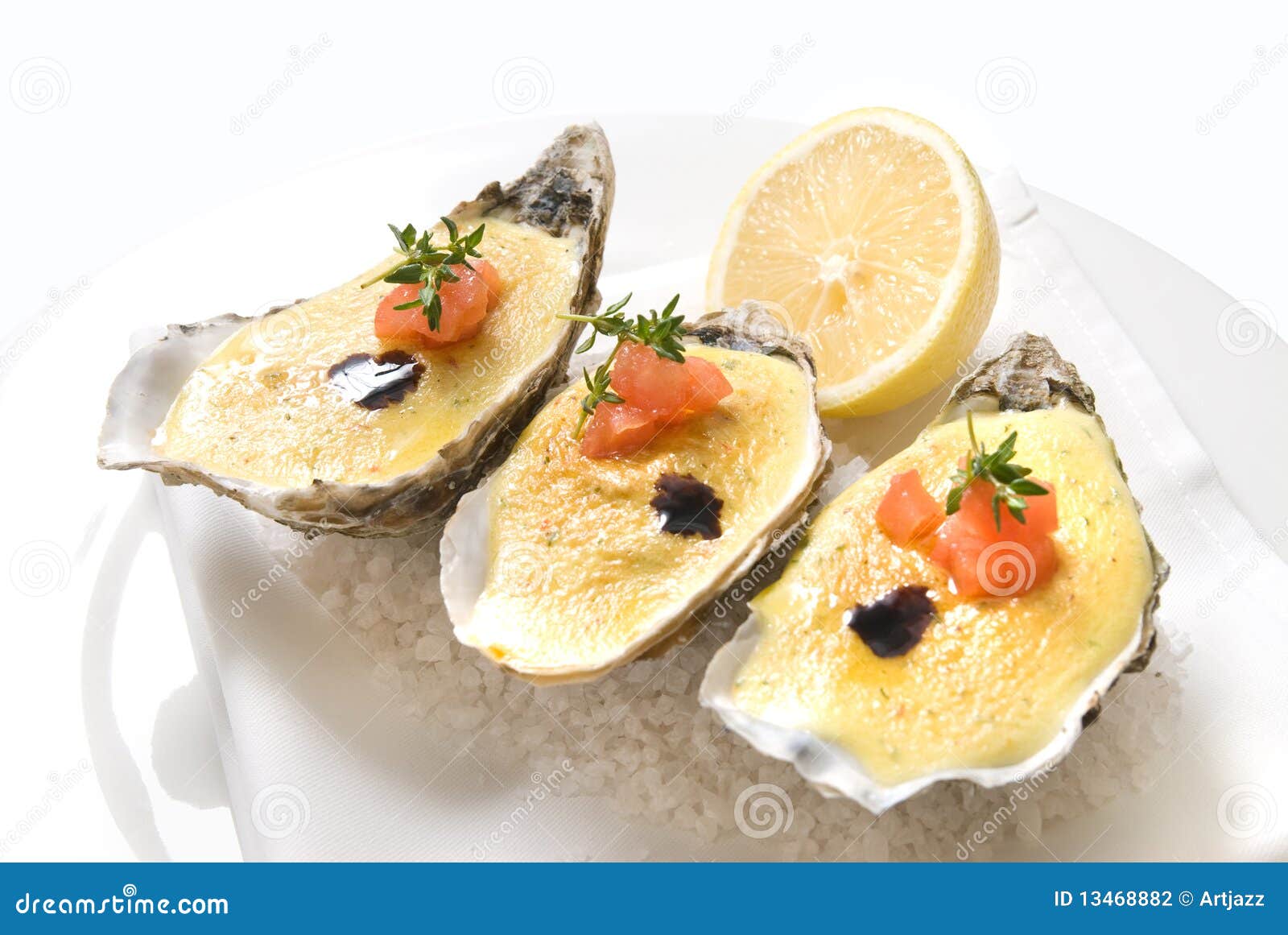 Oysters with Sauce and Lemon Stock Photo - Image of oyster, isolated ...