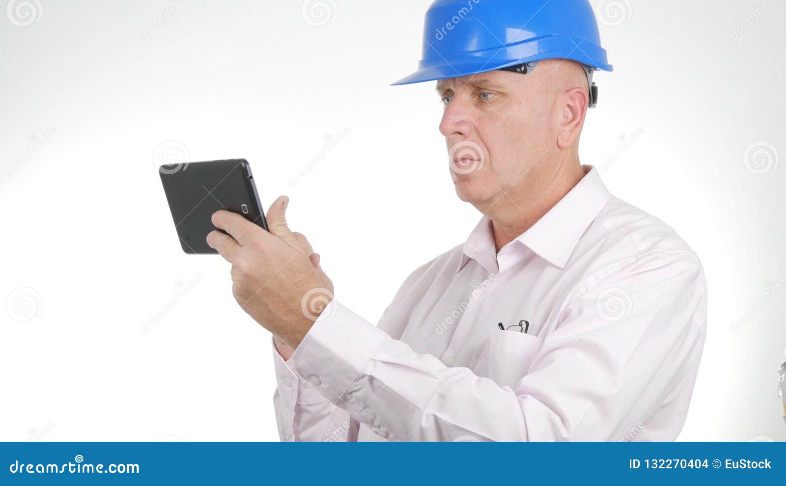 Engineer Use Wireless Remote For Control Industrial Robot Working On ...