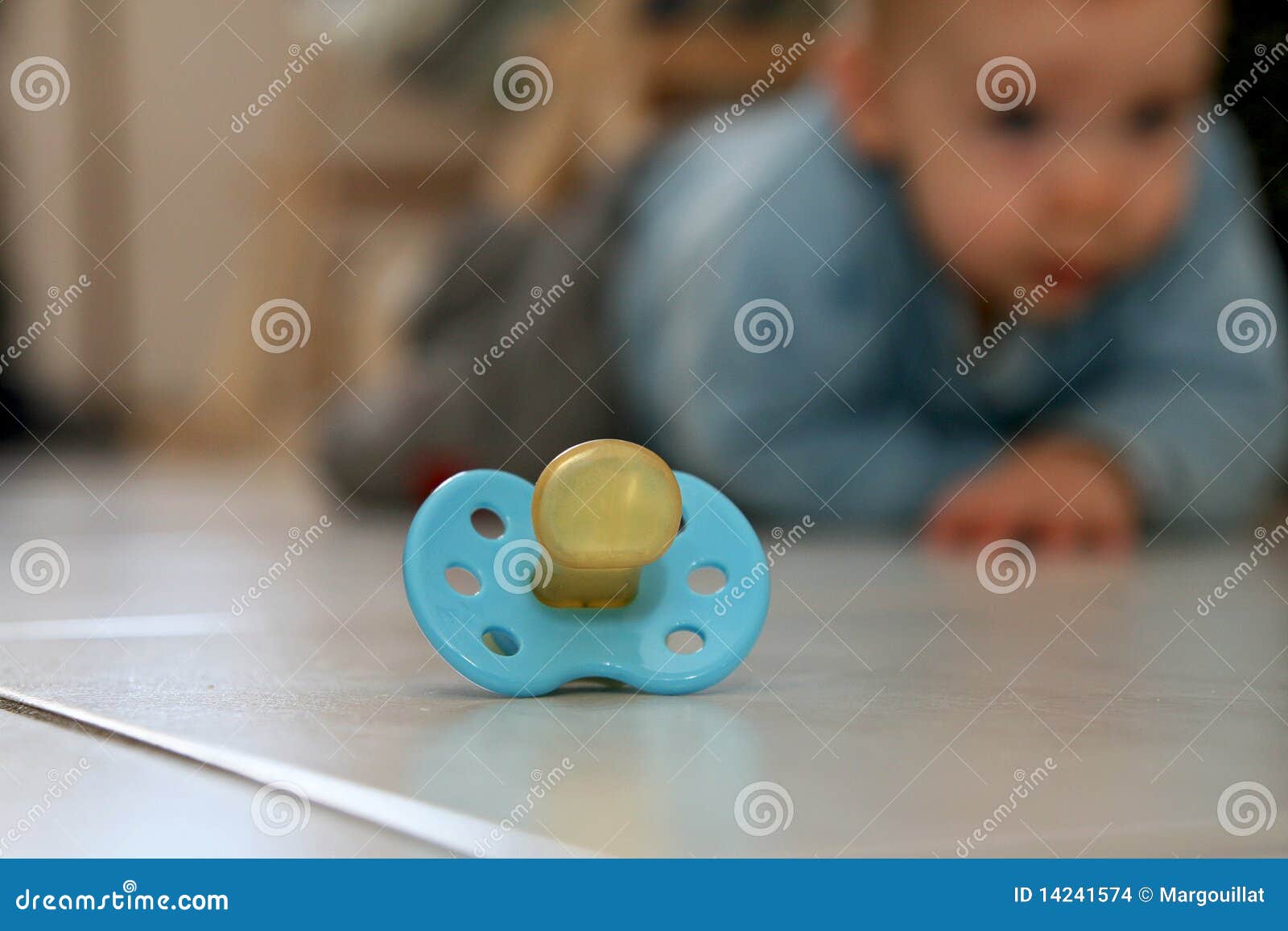 Pacifier stock photo. Image of blue, young, floor, angle - 14241574