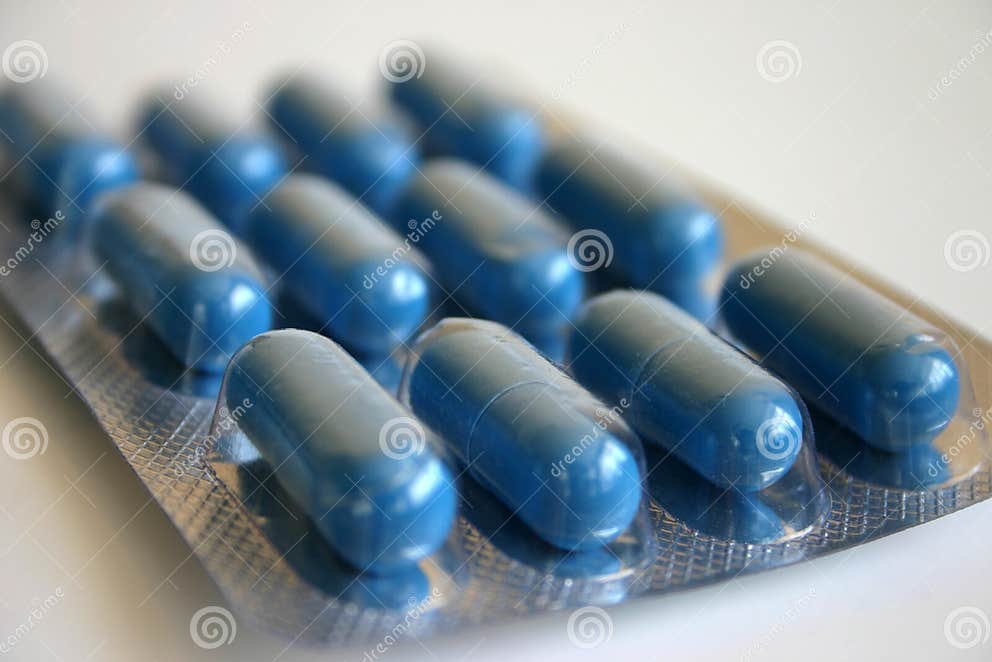 Pack of blue pills stock image. Image of buff, sick, macro - 22241