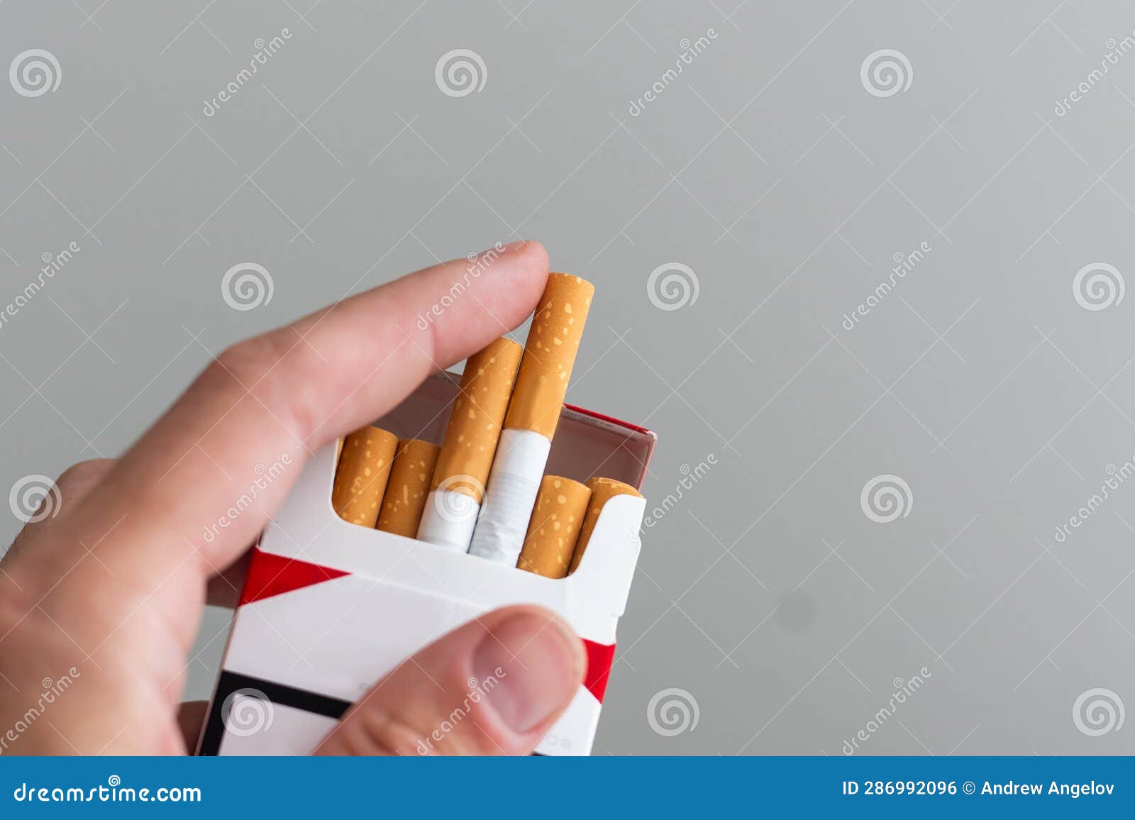 Pack of Cigarettes in Hand, on White Background Stock Photo - Image of ...