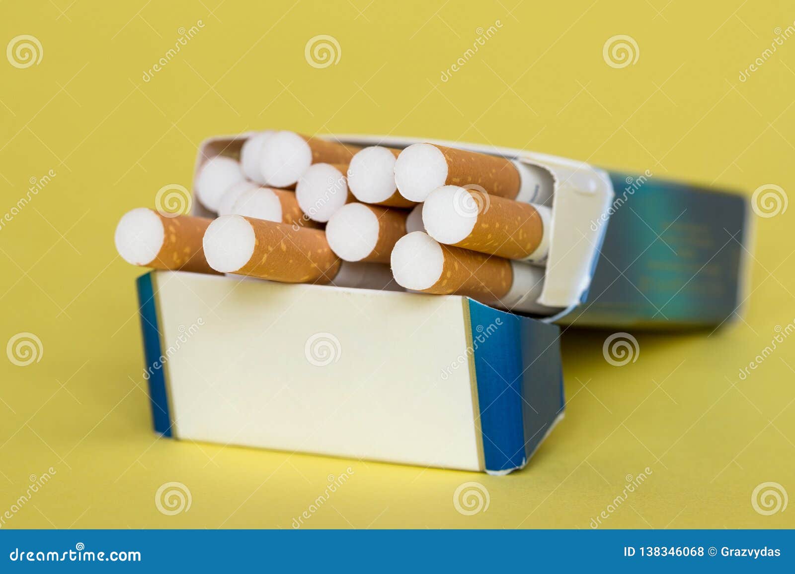 Pack of Cigarettes on Yellow Background Stock Photo - Image of problem ...