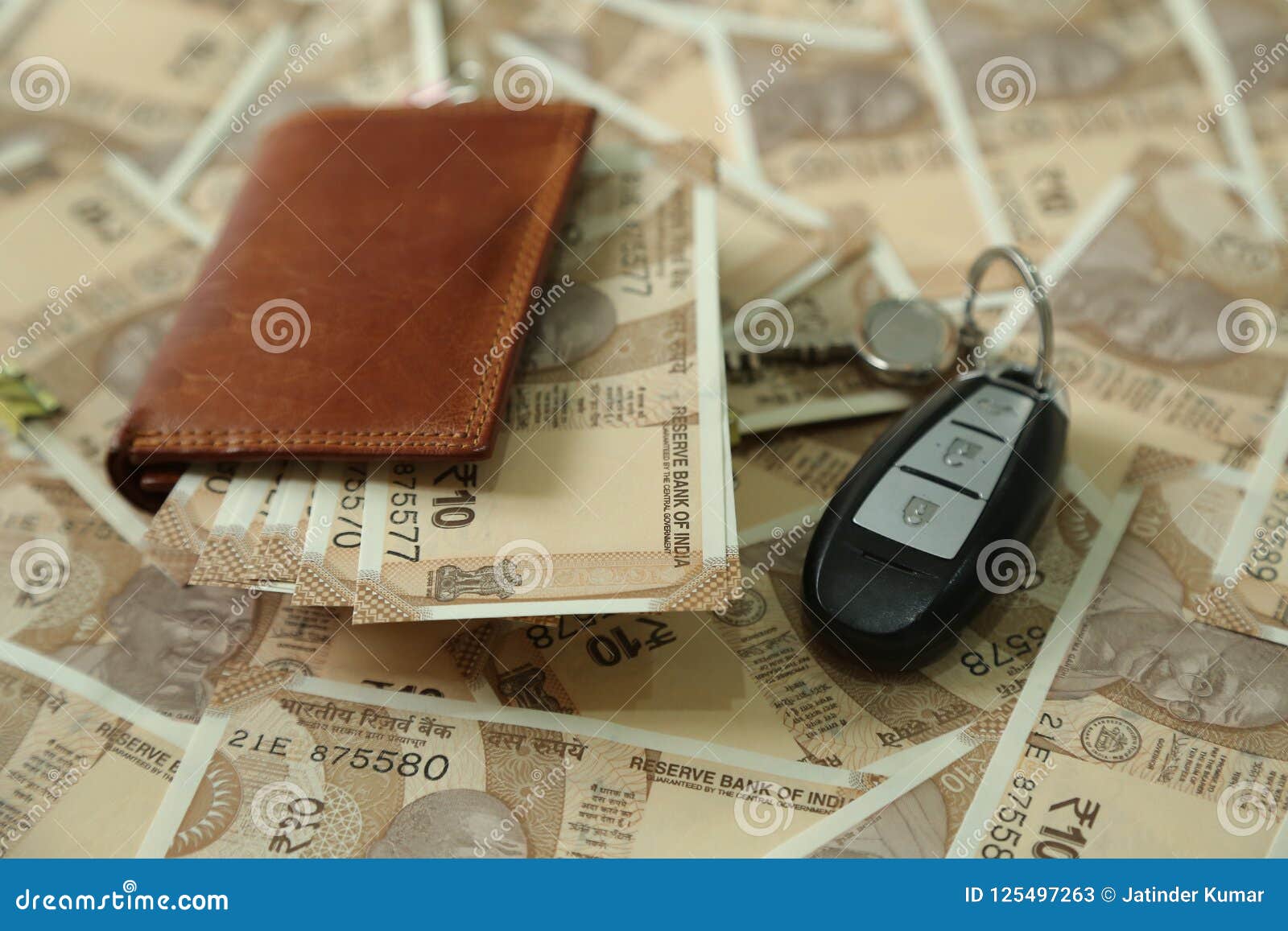 Pack of Indian Currency Notes in Wallet with Car Key on the 10 Rupee ...