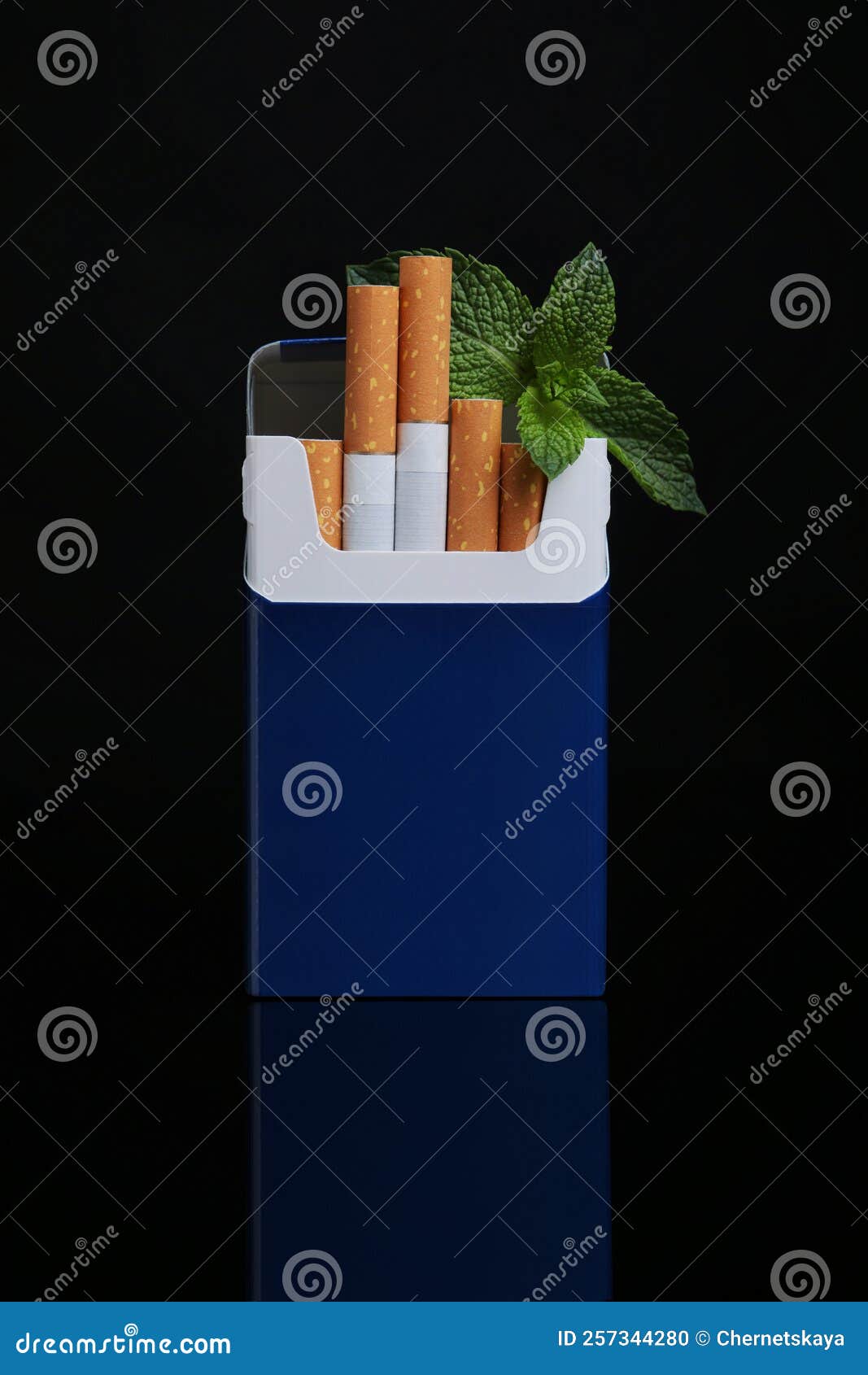 Pack of Menthol Cigarettes and Mint on Black Background Stock Photo ...