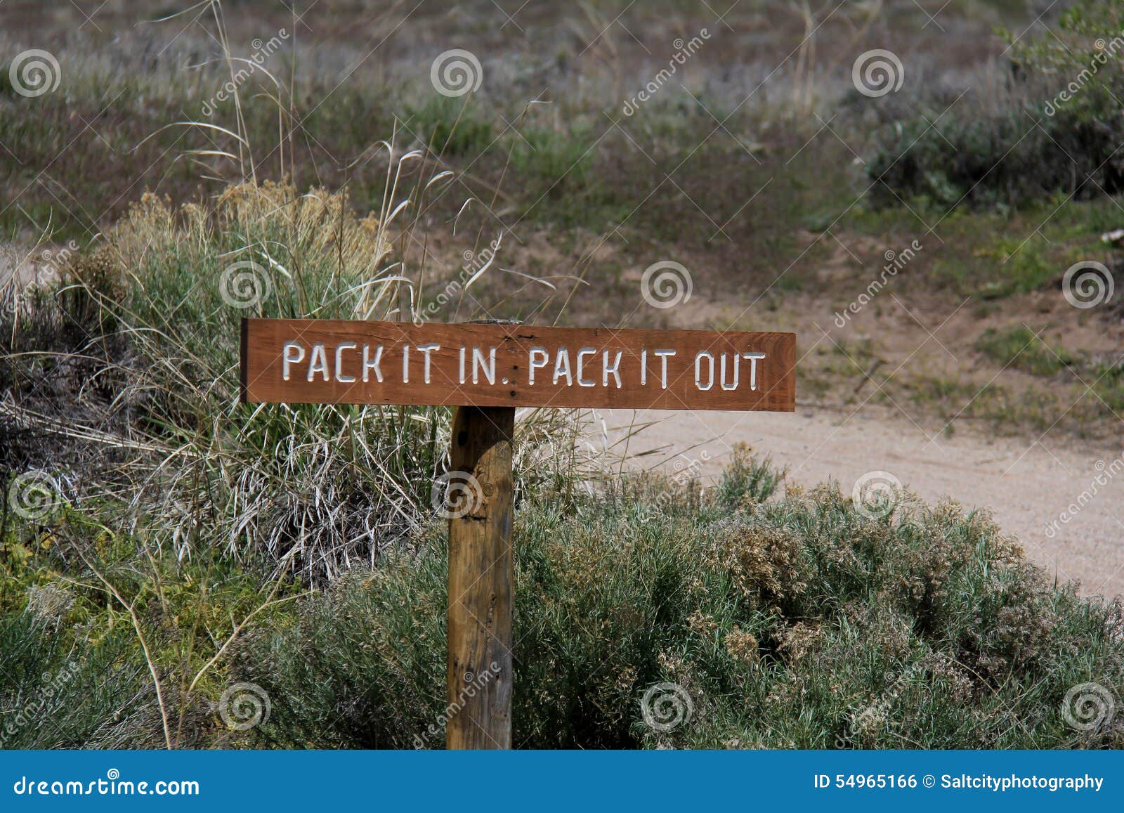 Pack it in, Pack it out! stock photo. Image of warning - 54965166