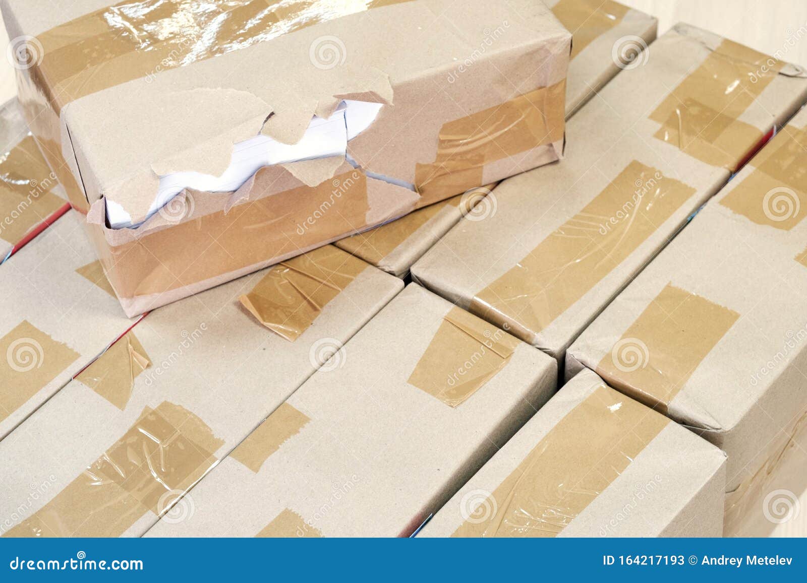 Pack With Paper Sealed Damaged Packaging On The Background Of Other ...