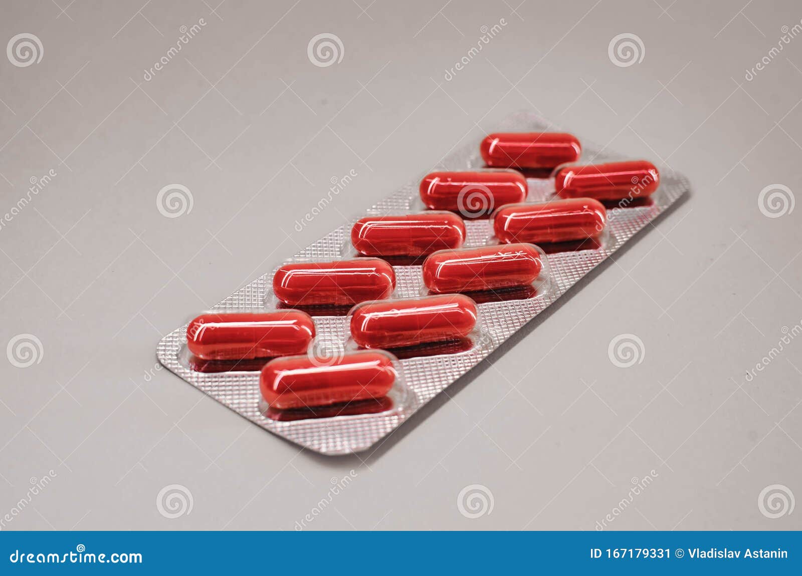 Pack of Red Capsules-tablets in the Amount of Ten Pieces. the View from ...