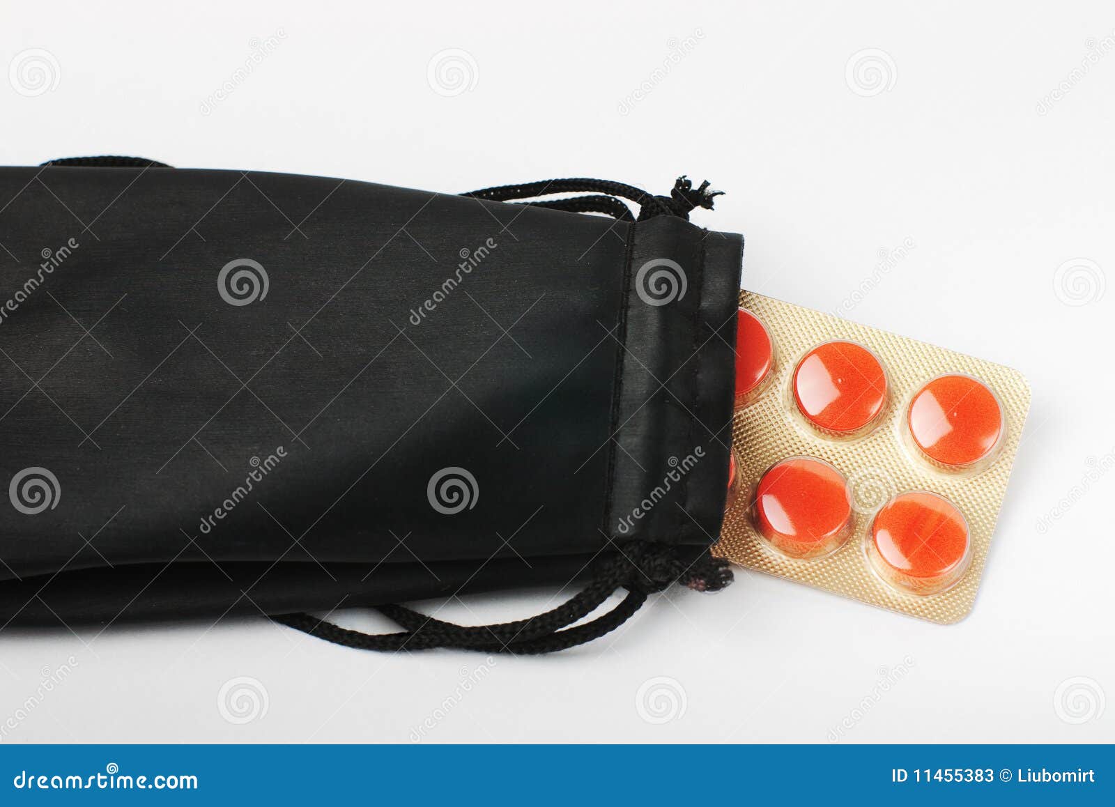 Pack of Red Pills Sticking Out of Black Bag Stock Image - Image of ...