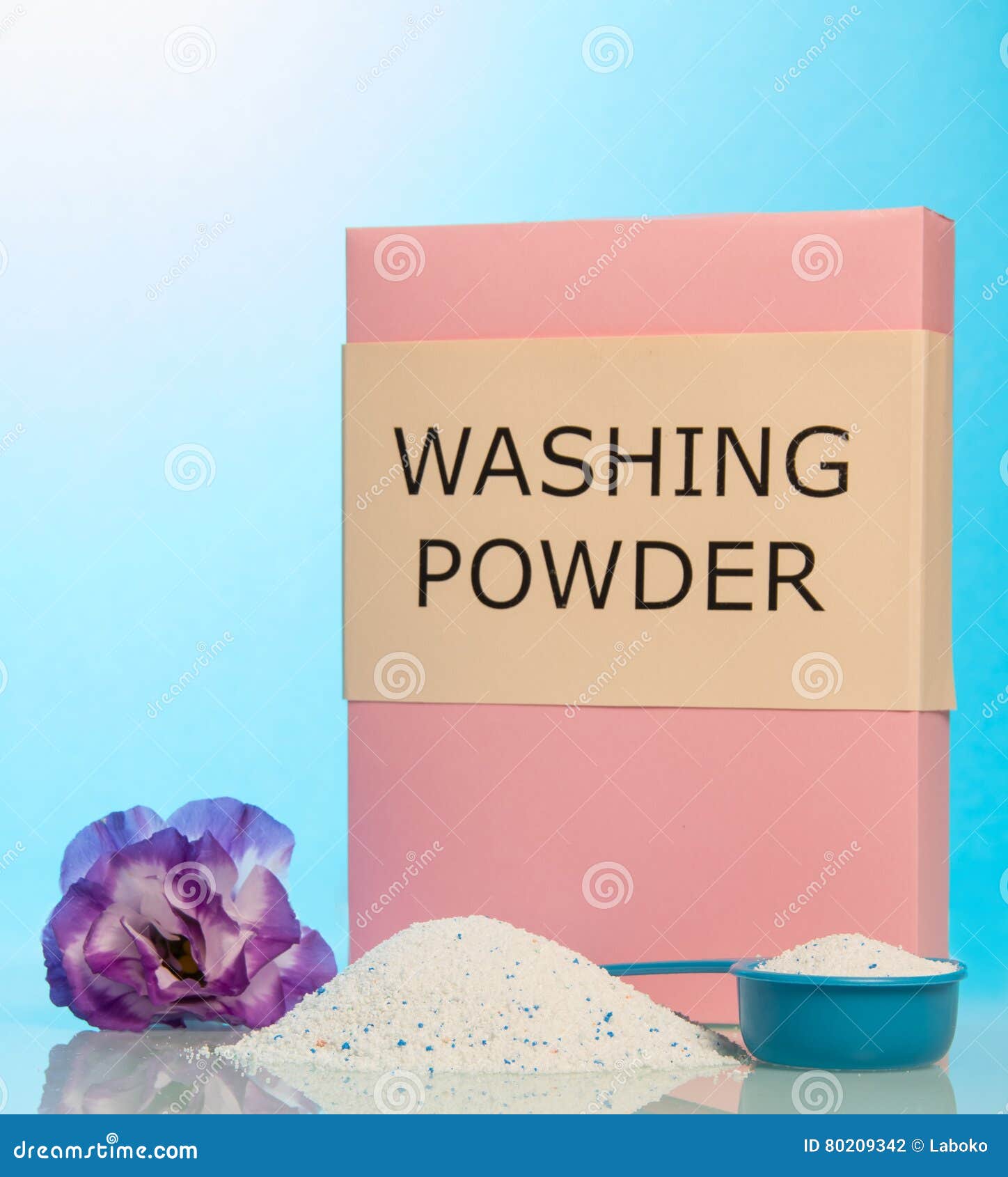 Pack Washing Powder in Measuring Cup, Pile on Blue Background. Stock ...