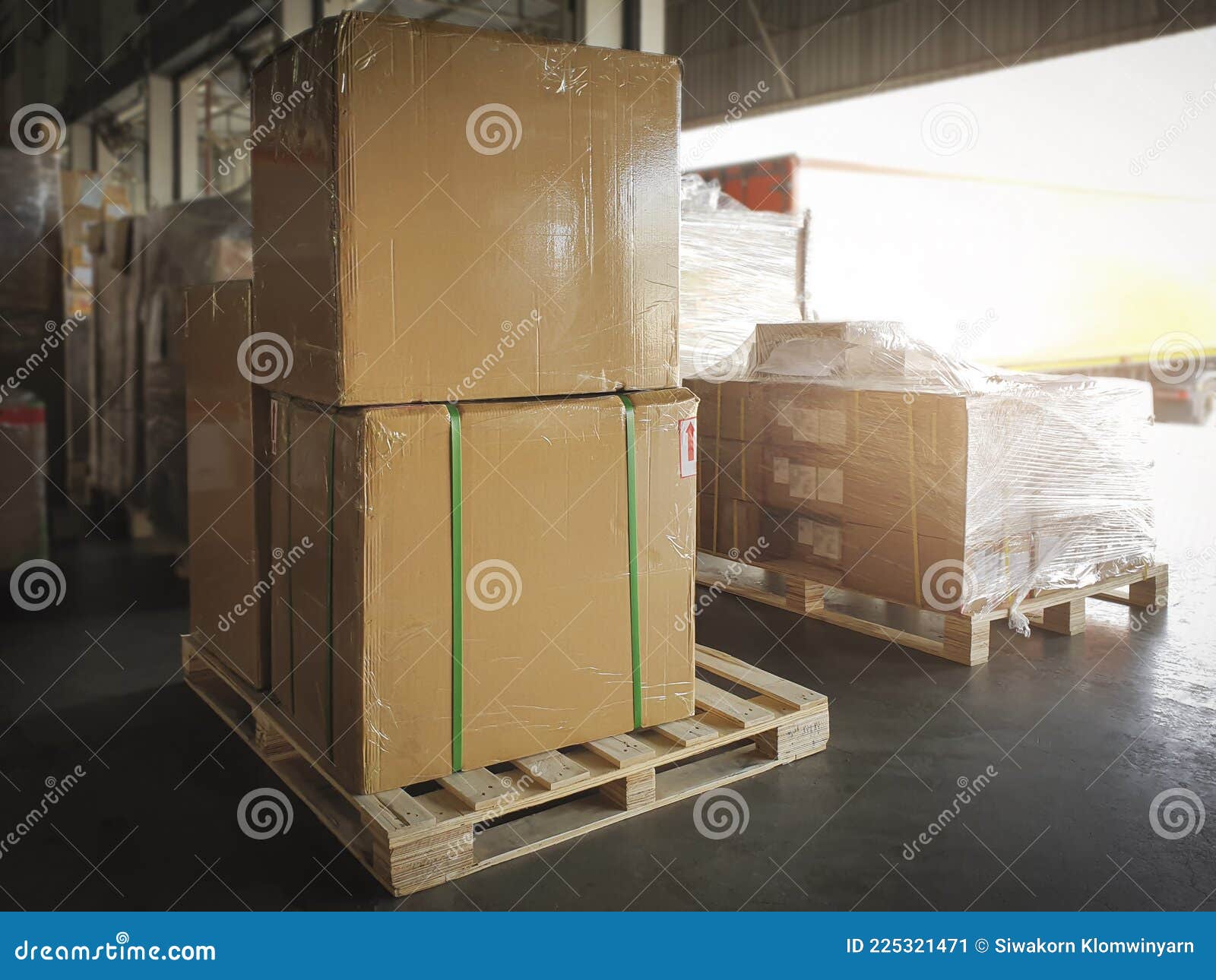 Package Boxes Load with Cargo Container. Trailer Truck Parked Loading ...