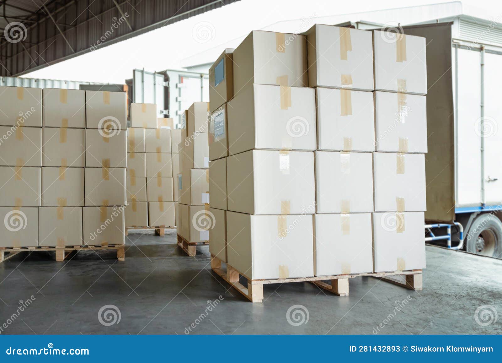 Package Boxes Stack on Pallets Loading into Cargo Container. Supply ...