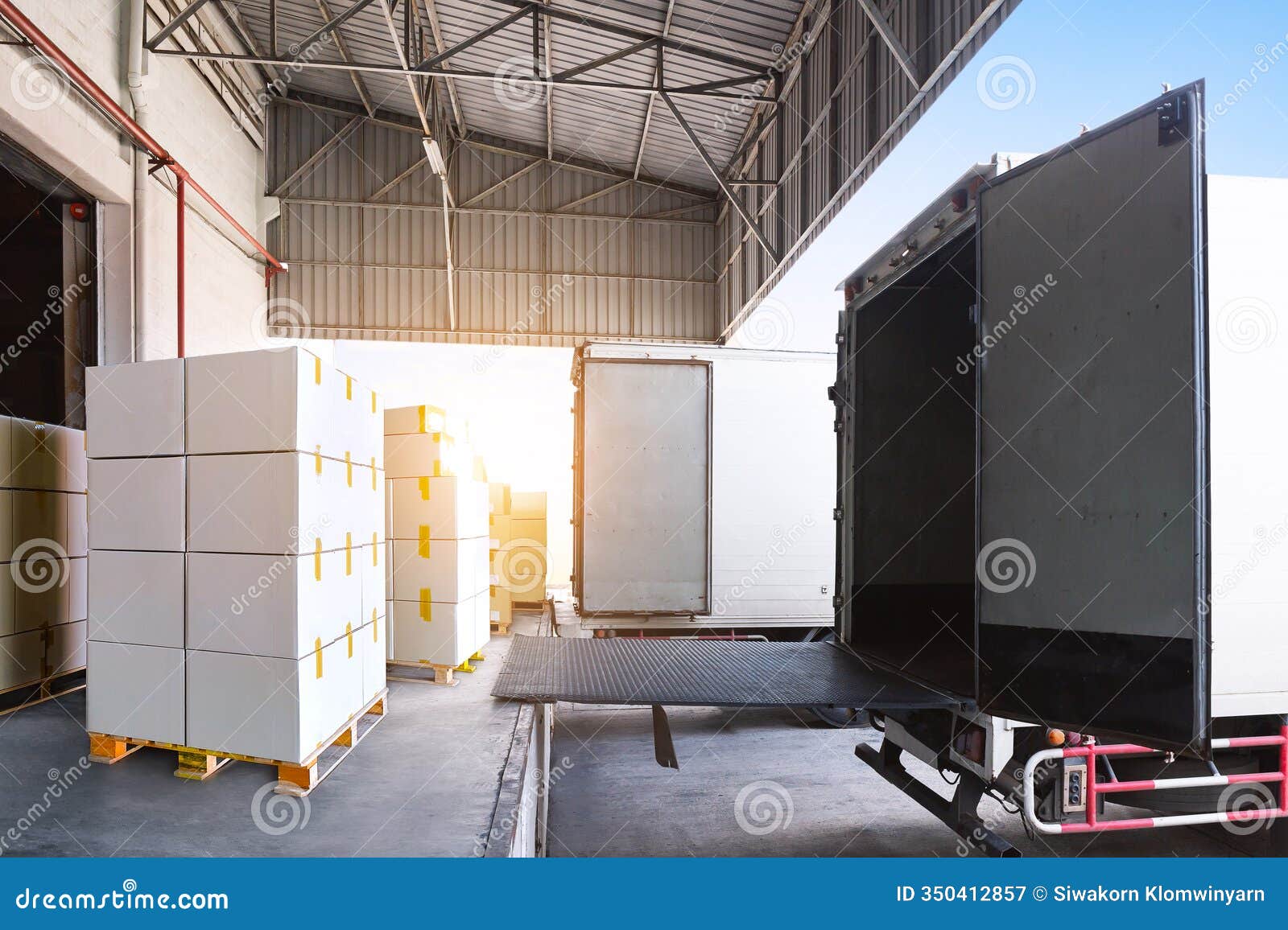 Package Boxes Stacked on Pallets Loading into Container Trucks ...