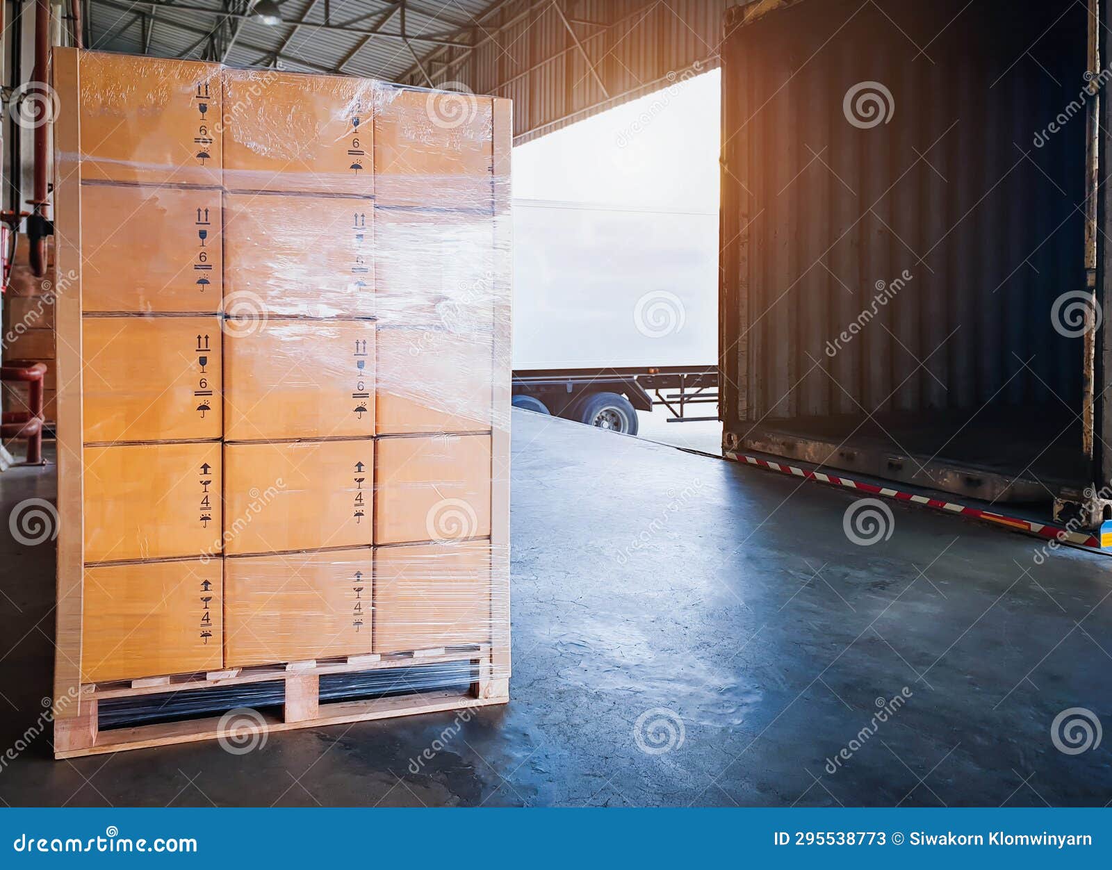 Package Boxes Stacked on Wooden Pallets Loading into Container Trucks ...