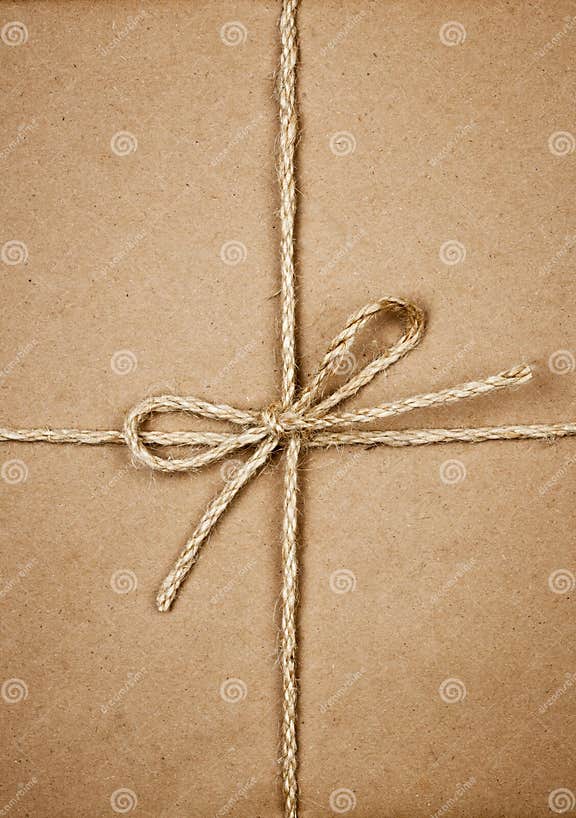 Package in Brown Paper Tied with String Stock Image - Image of ...
