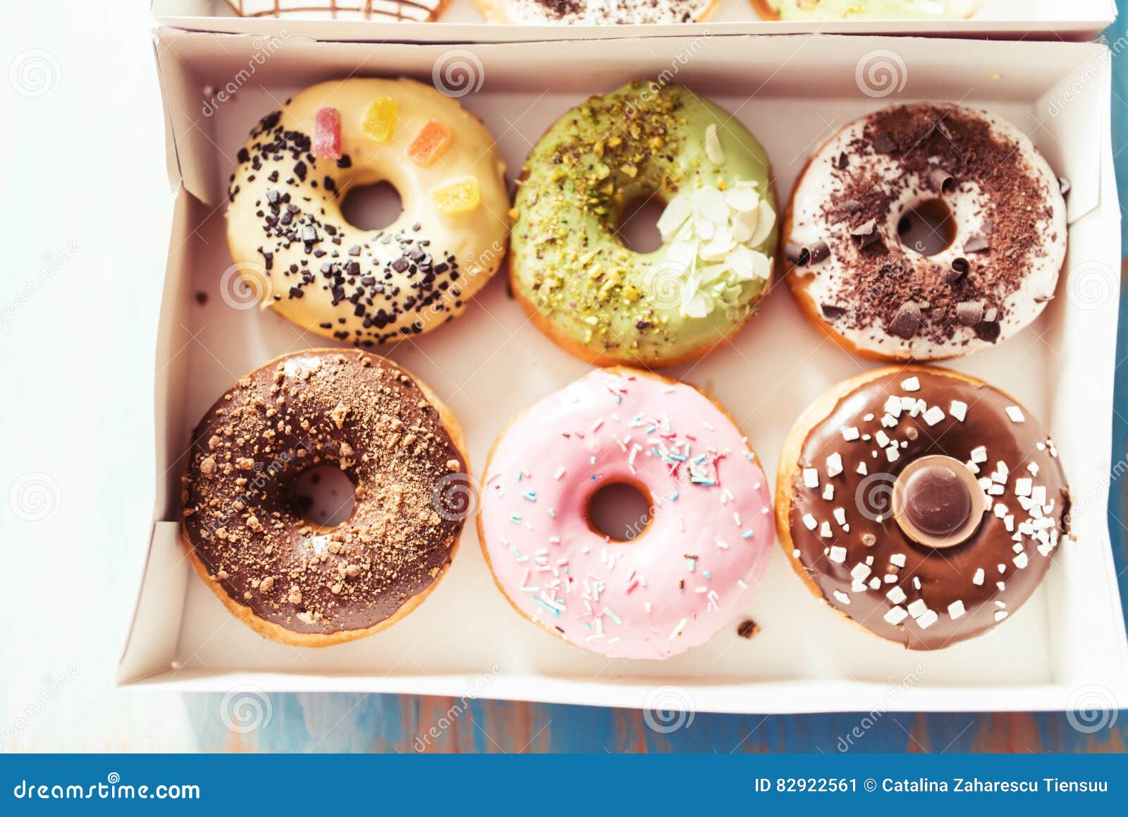 A package of donuts stock image. Image of flavors, colorful - 82922561