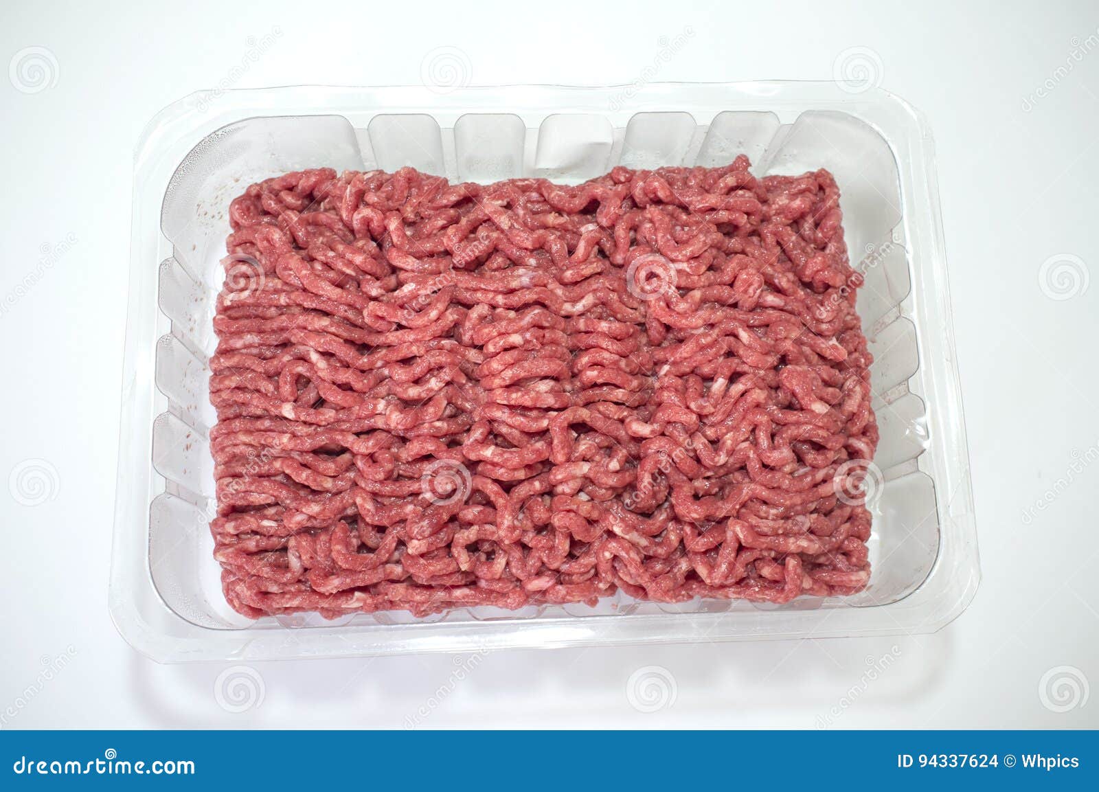 Package with Fresh Minced Meat Over a White Background Stock Photo ...