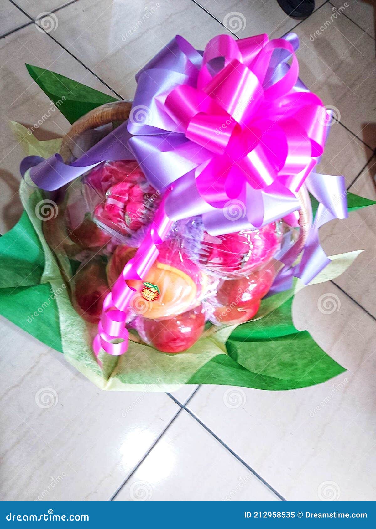 A Package of Fruit Parcels in a Ribbon Basket Stock Image - Image of ...